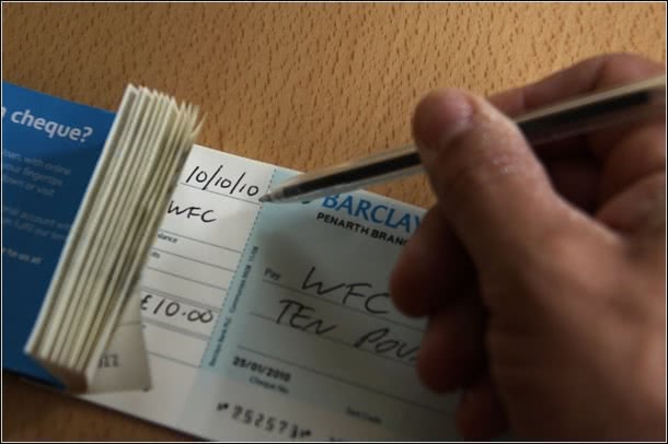 Como preencher um cheque - Economias